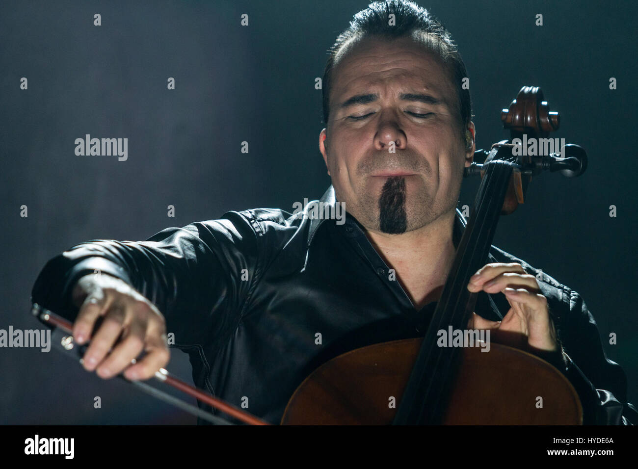 Finnish band Apocalyptica playing Metallica songs live in concert hall ...
