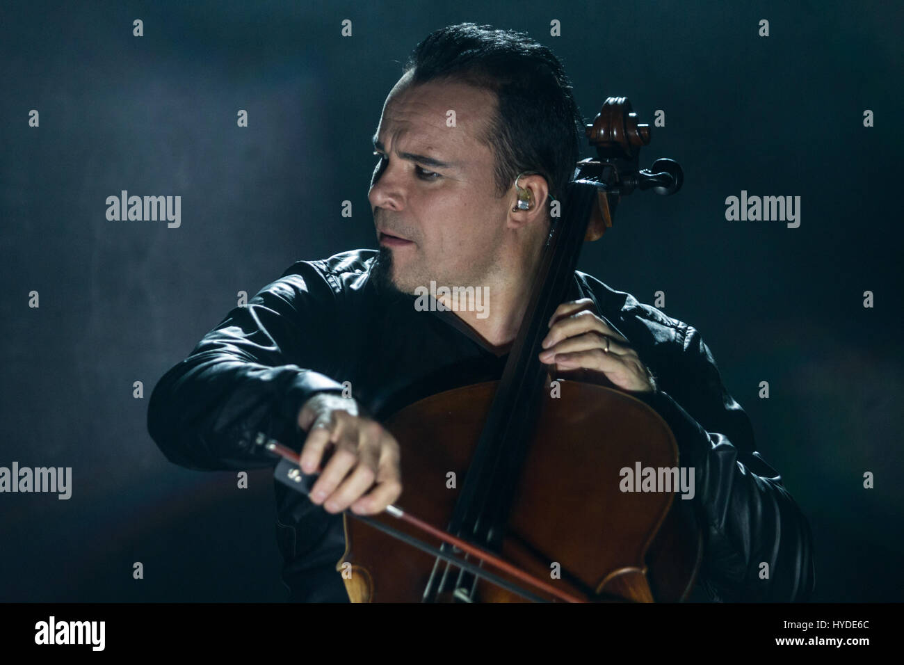 Finnish band Apocalyptica playing Metallica songs live in concert hall ...