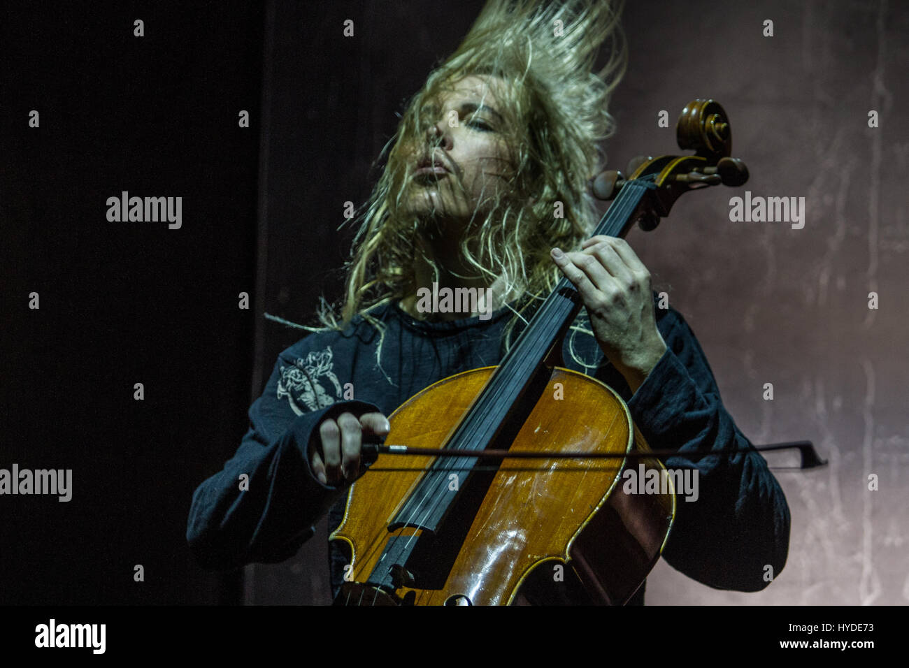 Finnish band Apocalyptica playing Metallica songs live in concert hall ...