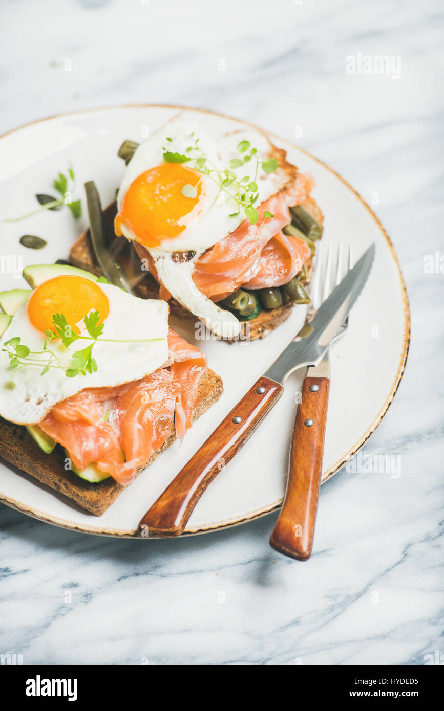 Healthy breakfast sandwiches in plate over marble background Stock ...
