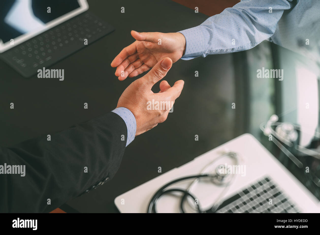 Medical and health care concept,Doctor and patient shaking hands in ...