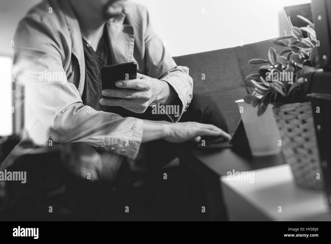 Online shopping tablet hand Black and White Stock Photos & Images - Alamy