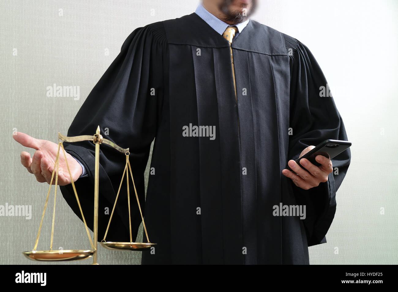 justice and law concept.Male judge in a courtroom with the balance ...
