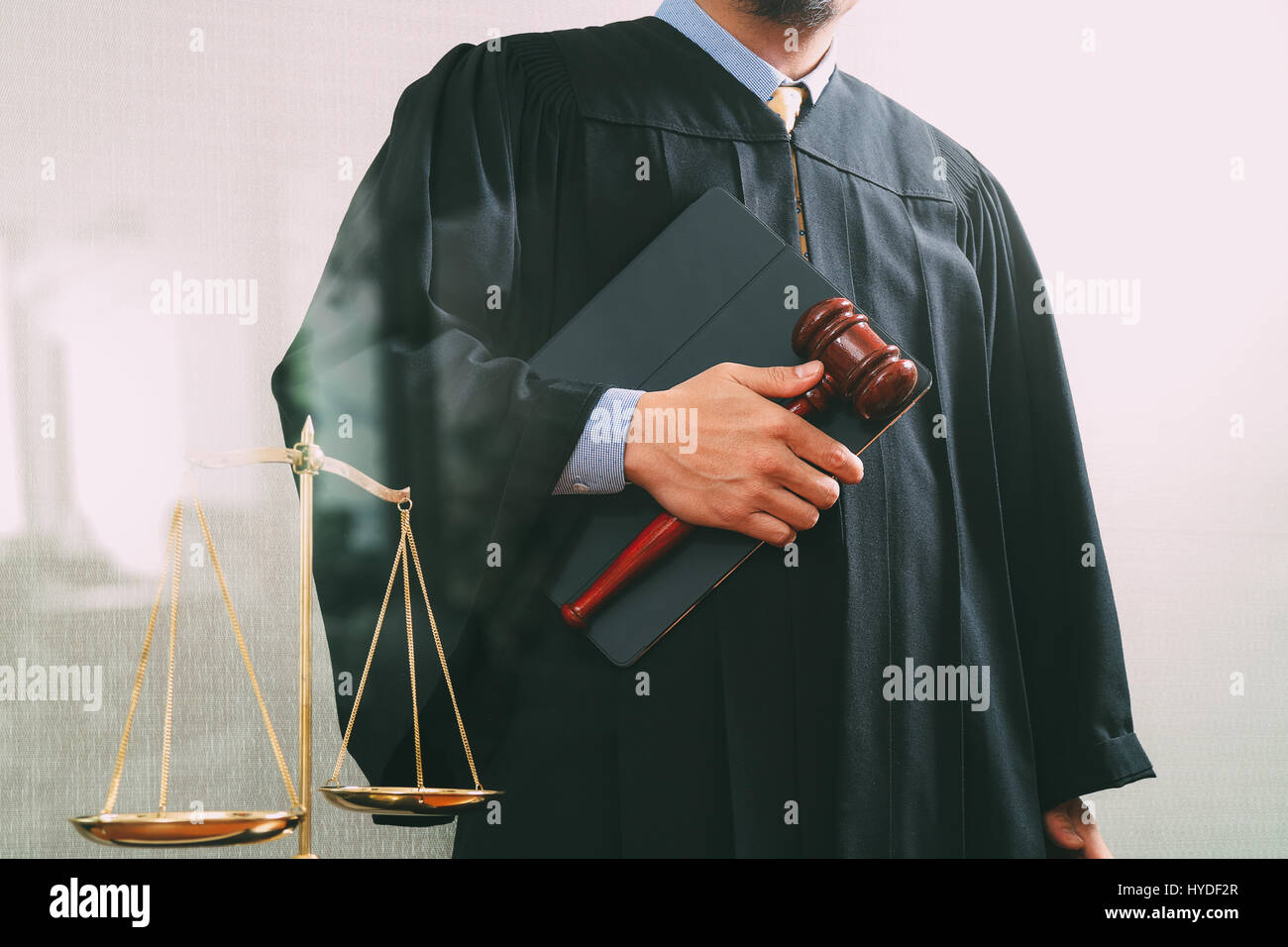 justice and law concept.Male judge in a courtroom with the gavel and ...