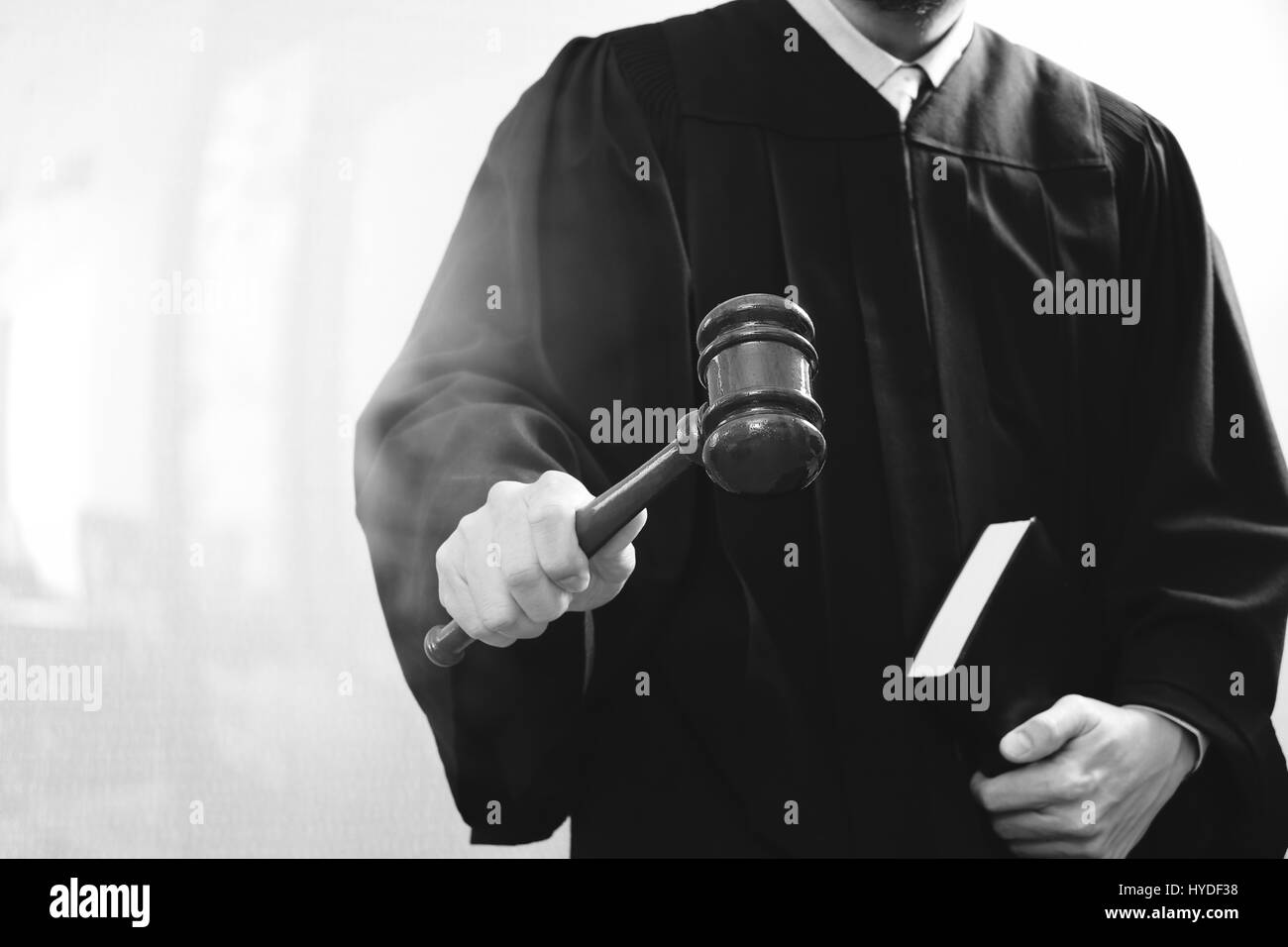 justice and law concept.Male judge in a courtroom with the gavel and ...