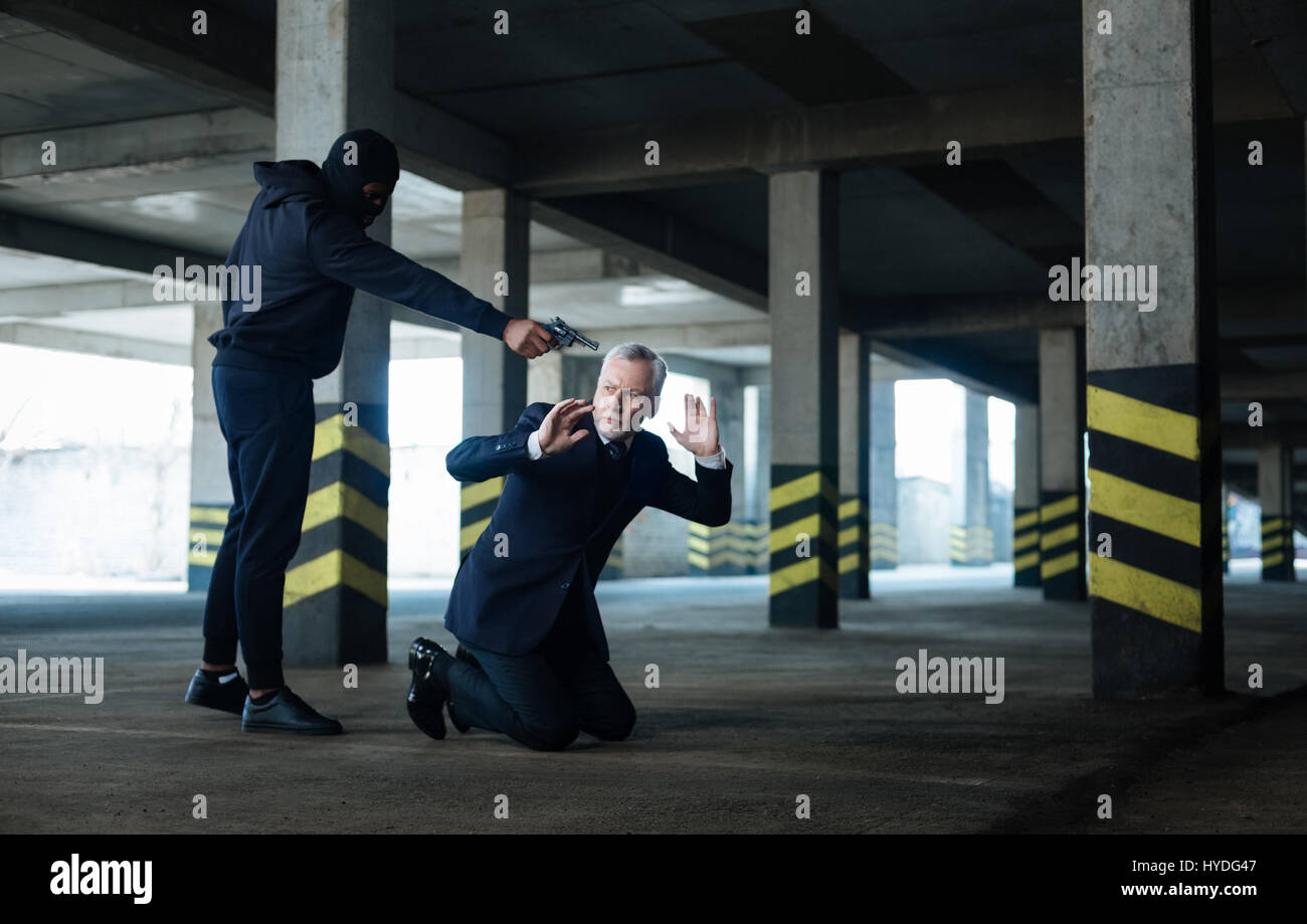 Falling to his knees hi-res stock photography and images - Alamy