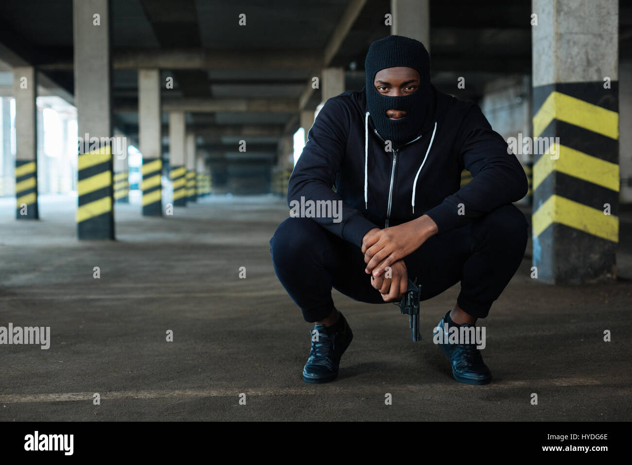Nice handsome criminal looking at you Stock Photo - Alamy