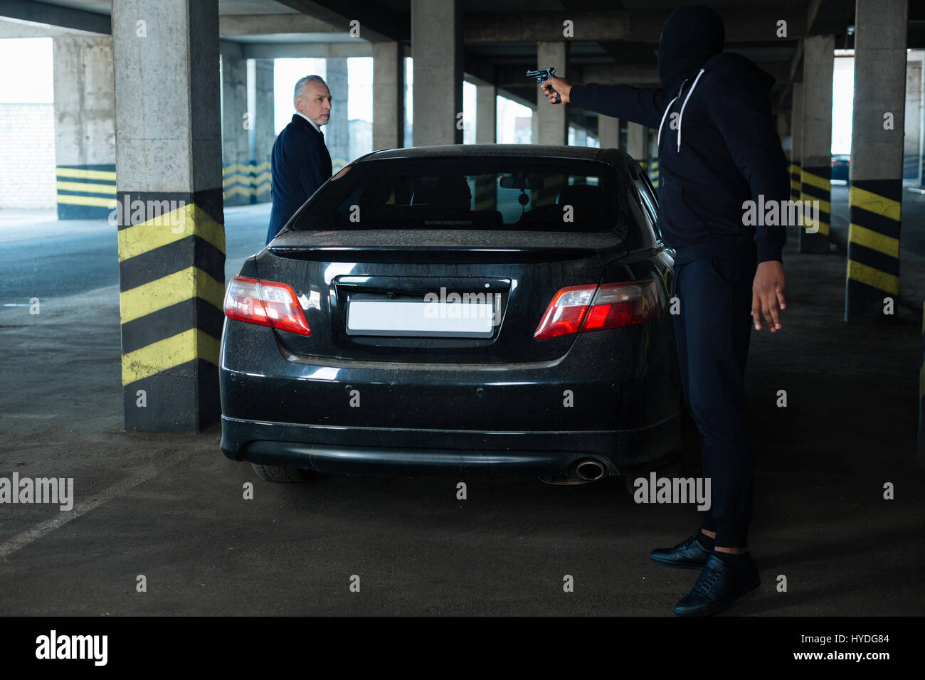 Good looking nice businessman wanting to get into his car Stock Photo ...