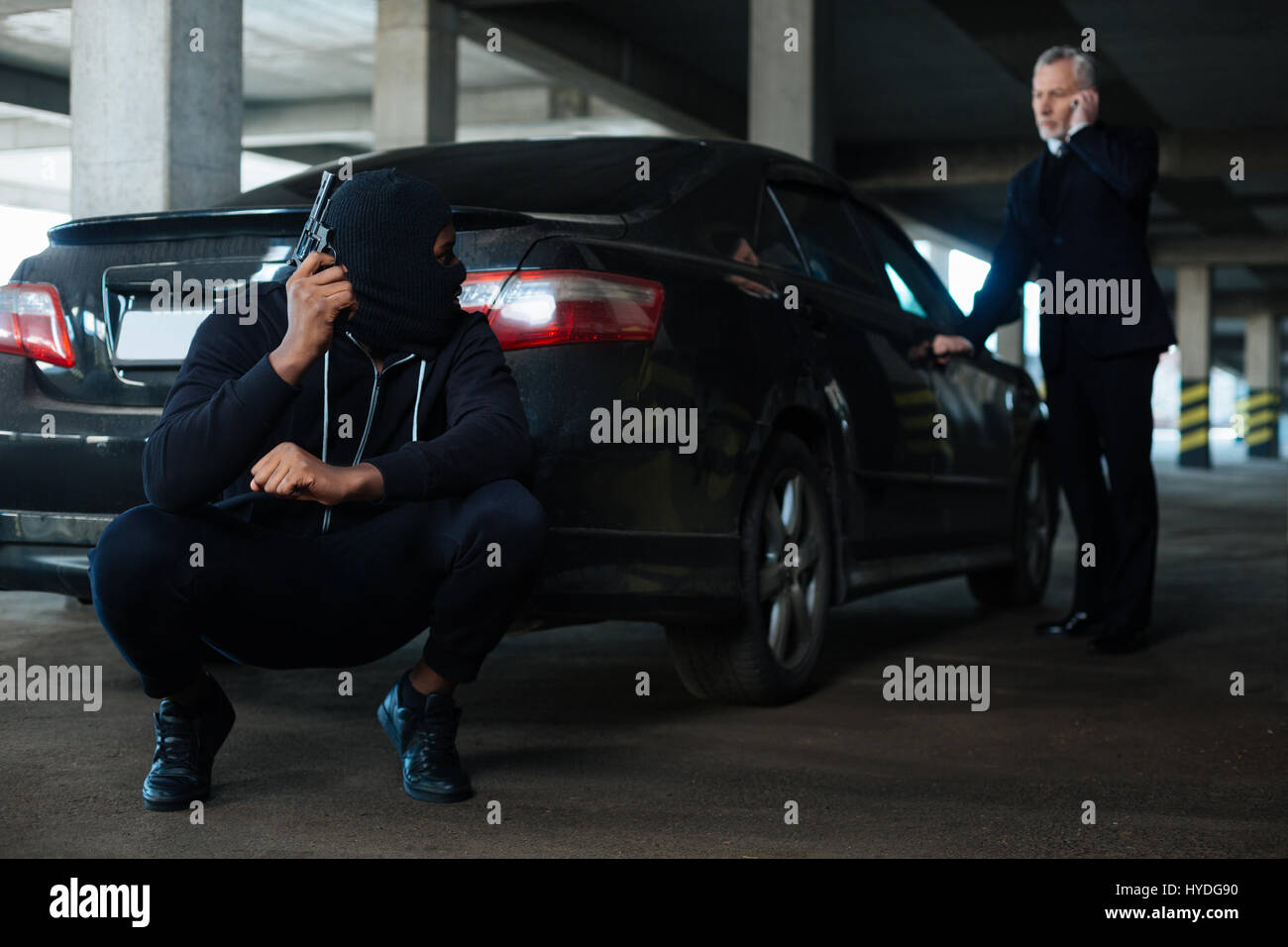 Its too early. Serious armed adult criminal sitting behind the car and ...