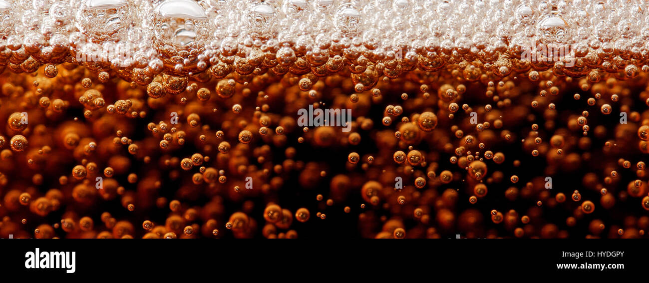 Macro shot of cola bubbles Stock Photo - Alamy