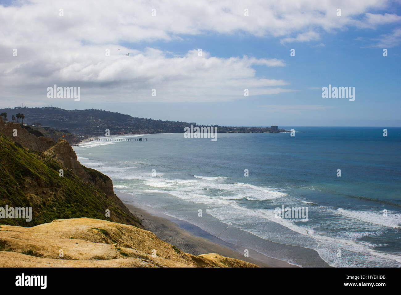 Beach shot from cliff with pier Stock Photo - Alamy