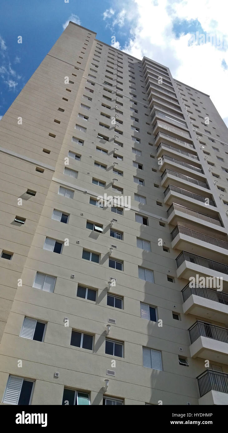 The facade of a tall residential building Stock Photo - Alamy