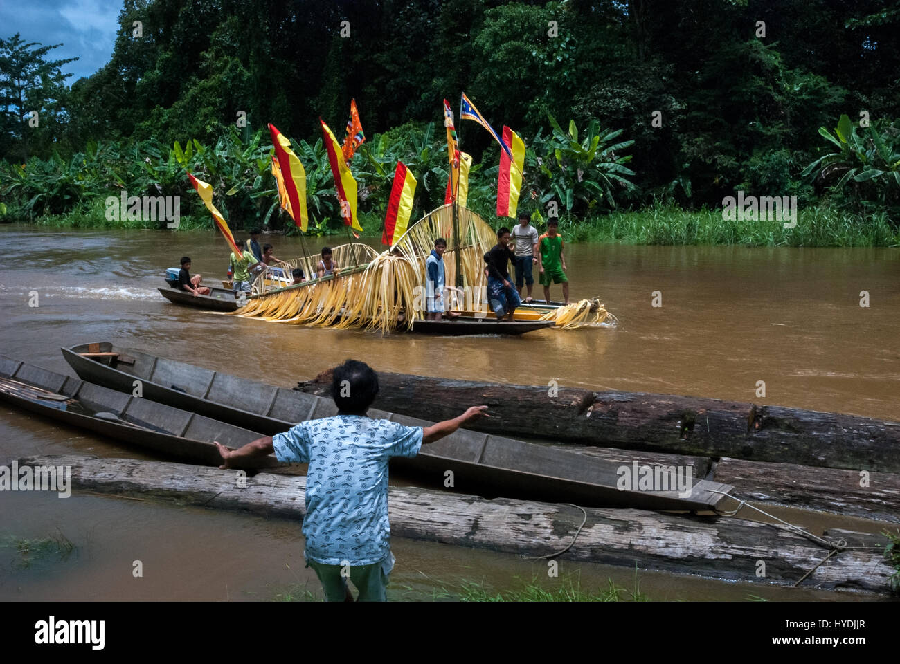 Uluk Palin longhouse community chief, Moses Salo, dancing solemnly to ...