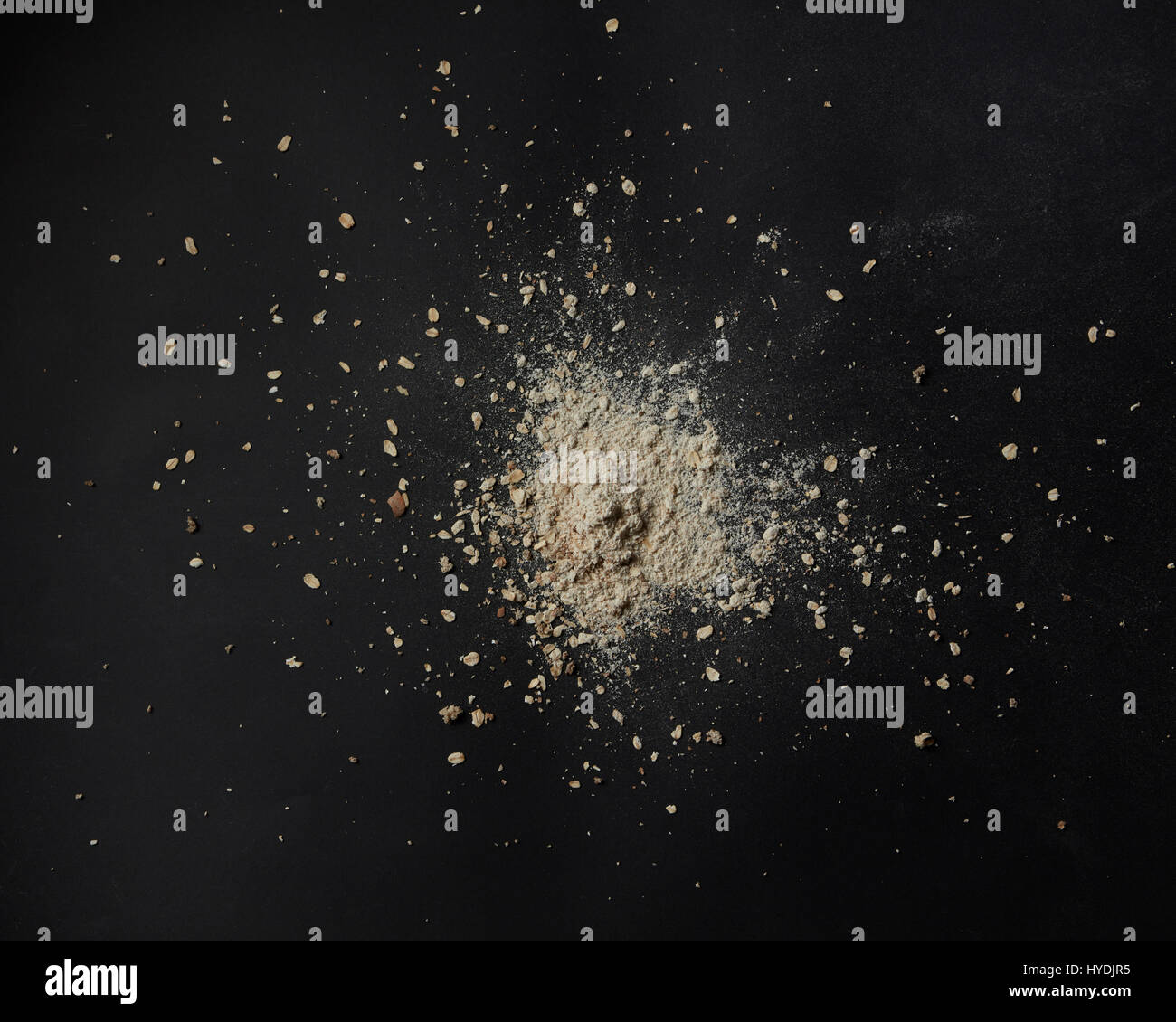 Sprinkled flour over background Stock Photo - Alamy