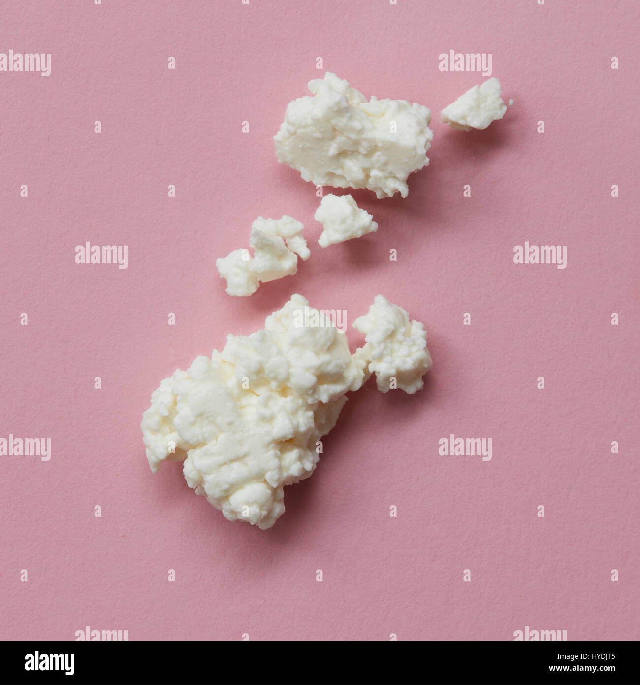 Cottage cheese over pink Stock Photo - Alamy