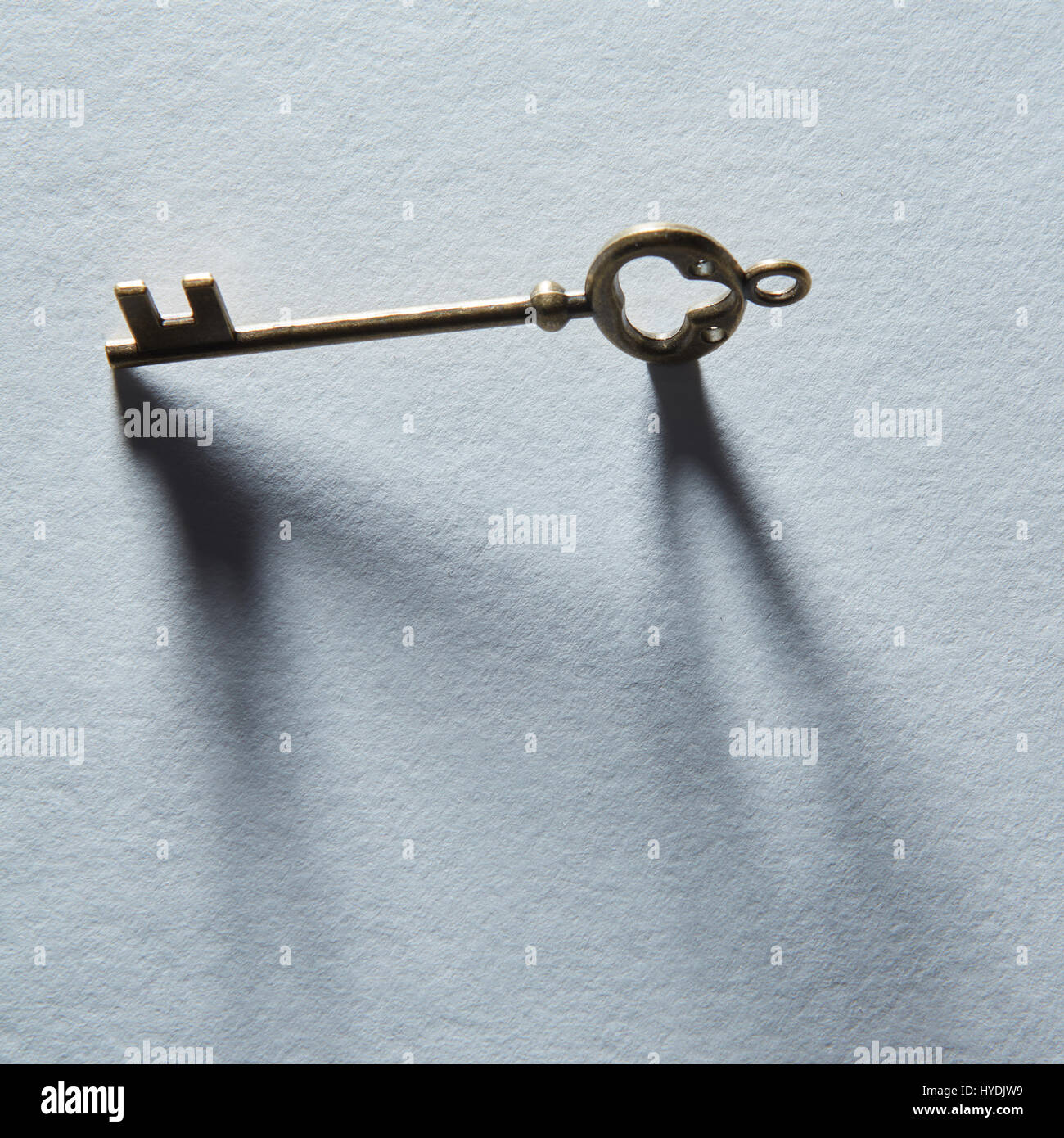Key represented on background Stock Photo - Alamy