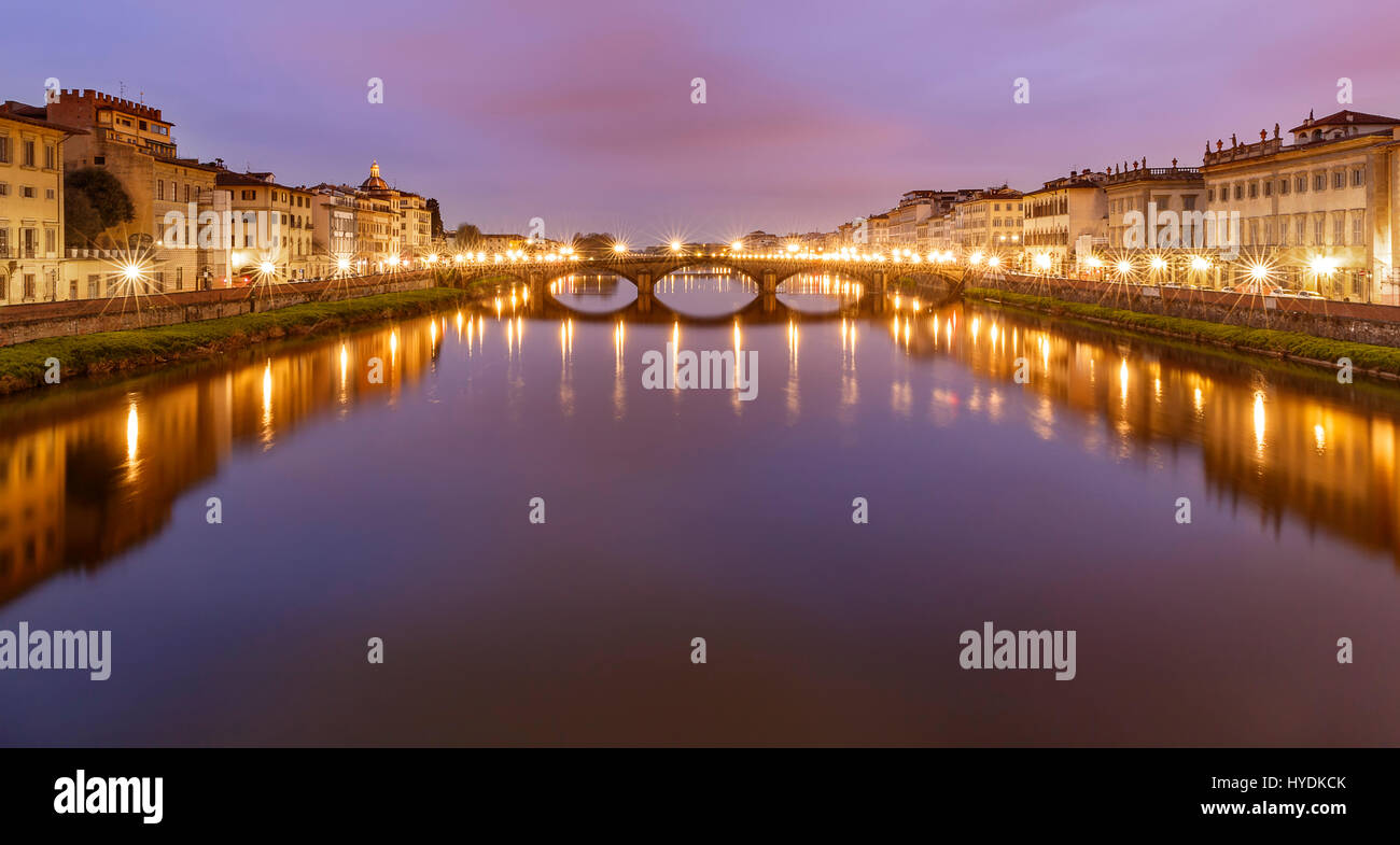 The Arno River flowing through Florence at sunrise.Italy Stock Photo ...