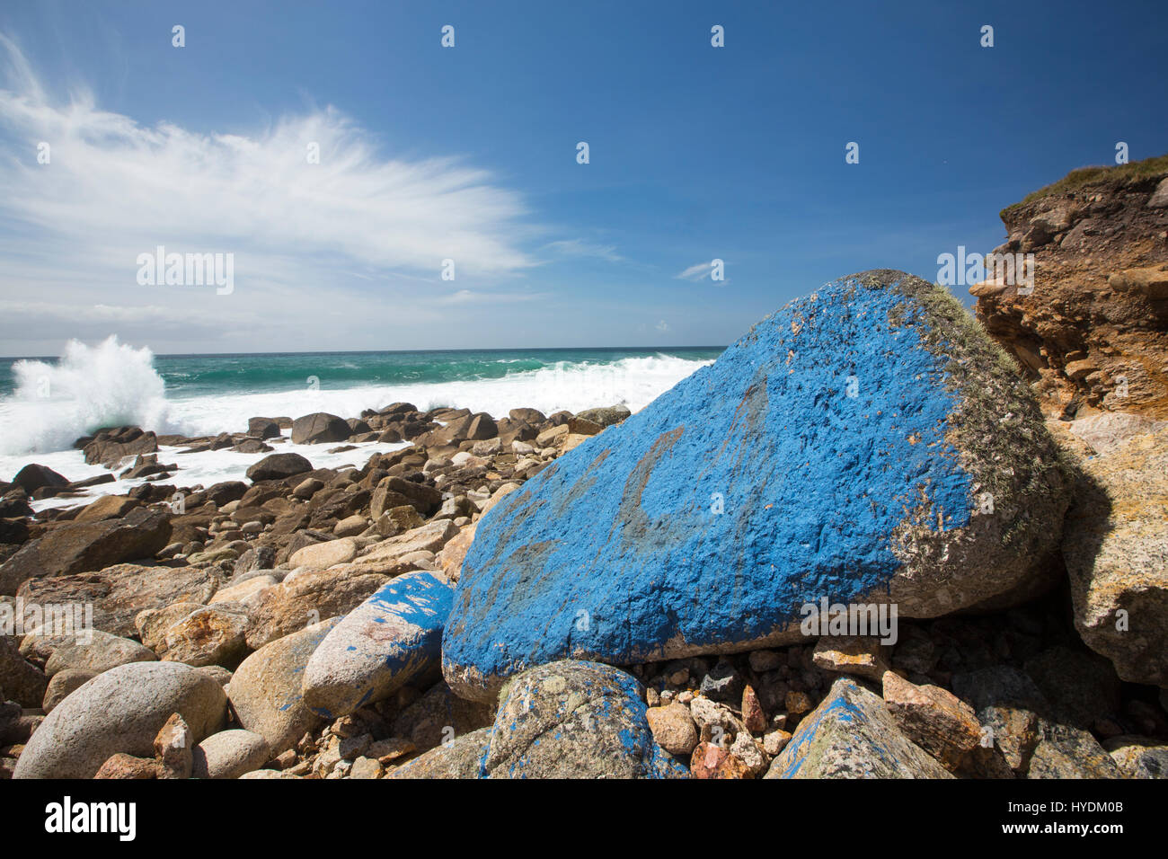 A blue painted boulder on the beach between St Just and Sennen ...