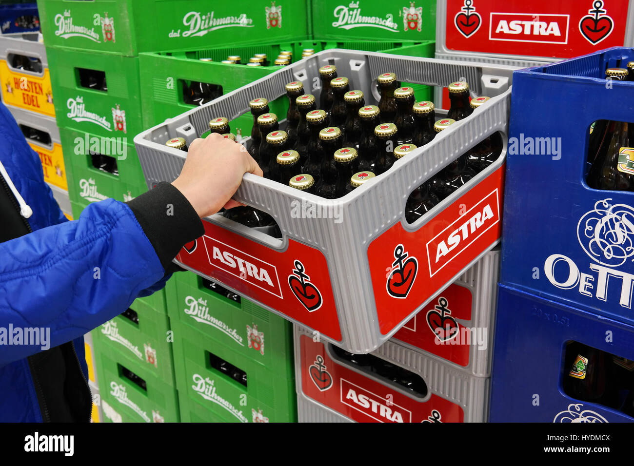 Astra beer crates in a supermarket. Astra is a brand name for pale ...