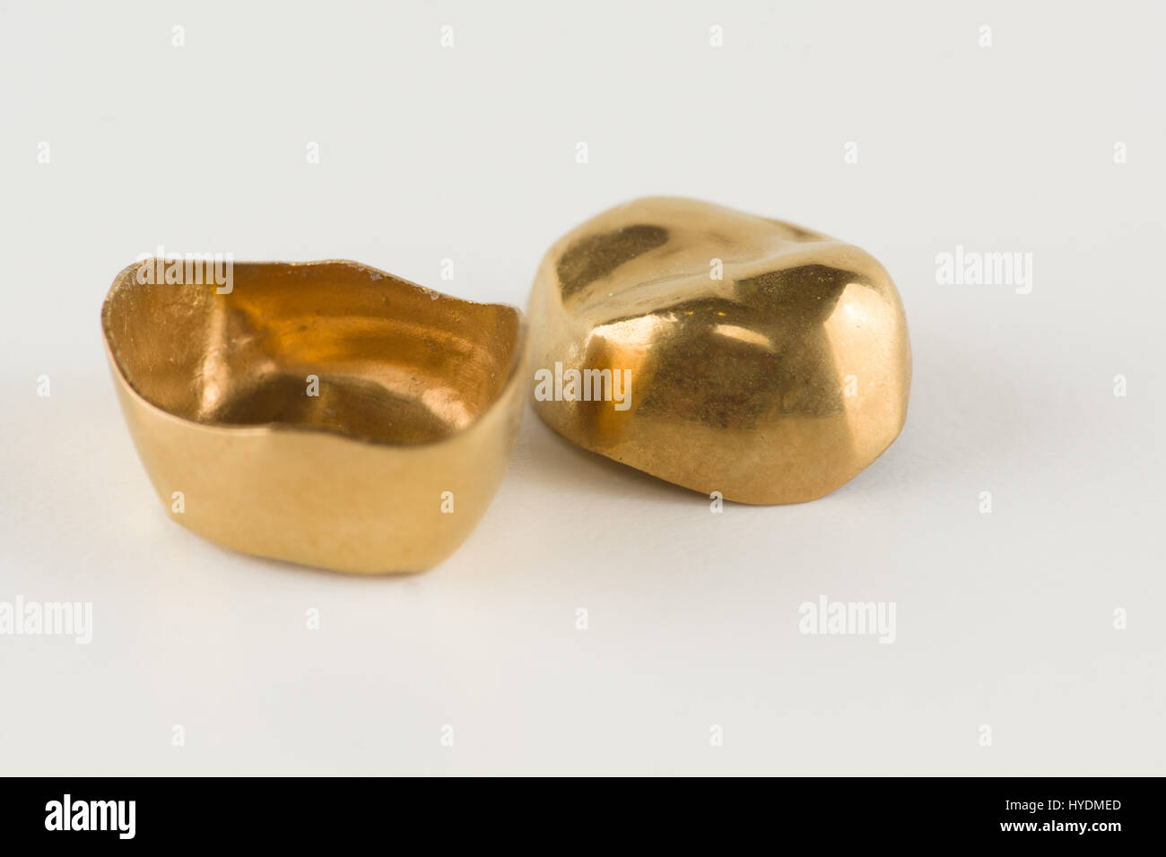 steel crowns with yellow coated with titanium nitride Stock Photo - Alamy