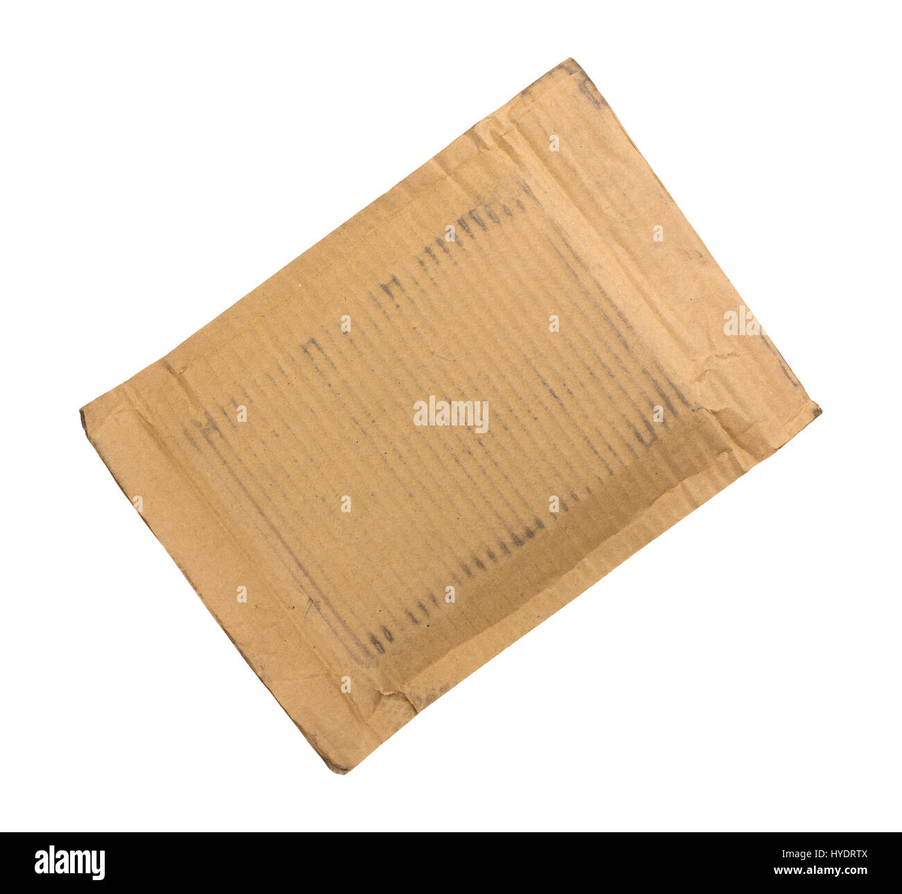 A worn cardboard packaging mailer used to mail media isolated on a ...