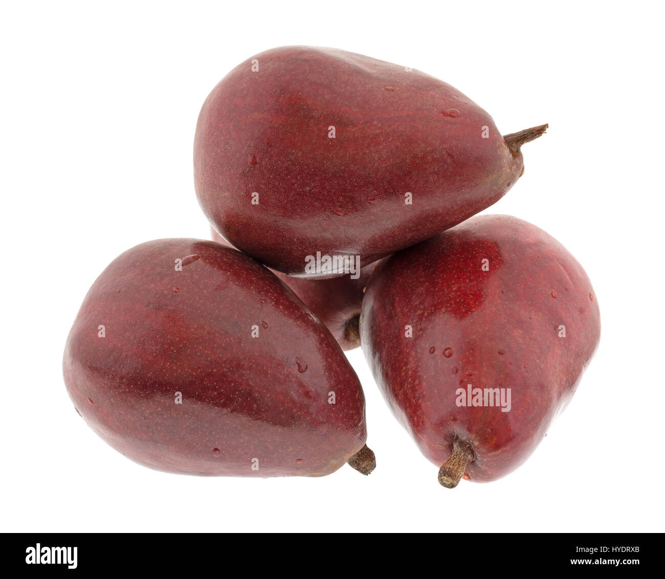 Four red pears arranged on a white background Stock Photo - Alamy