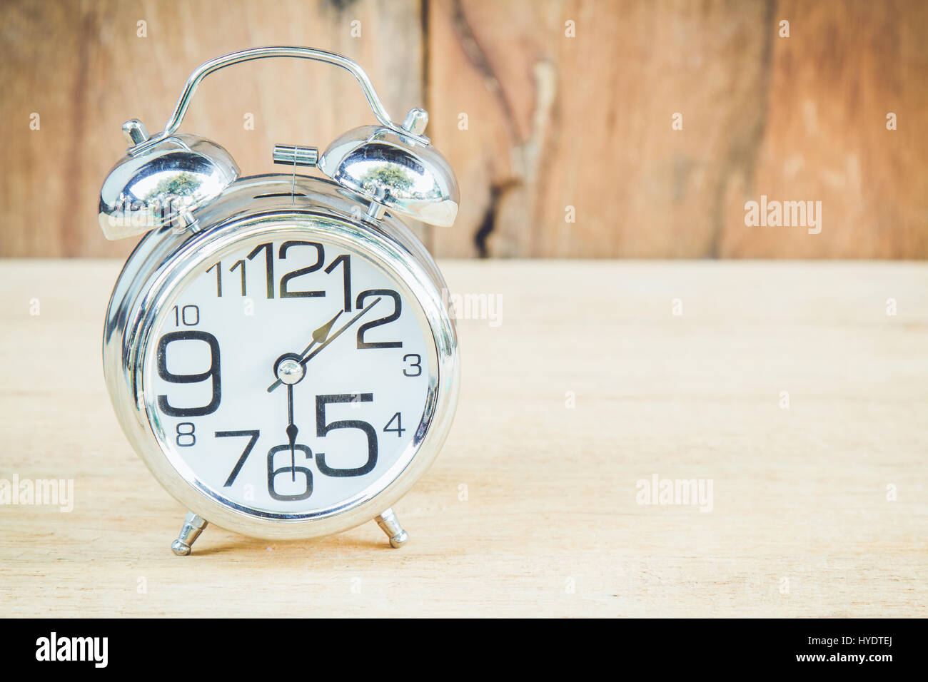 Clock show 1 am or pm and 30 minute on wood background with copy space ...