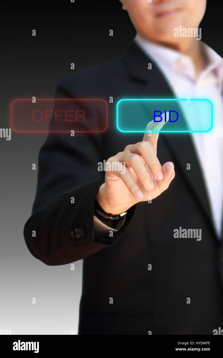 Business man finger pointing to choose BID Stock Photo - Alamy