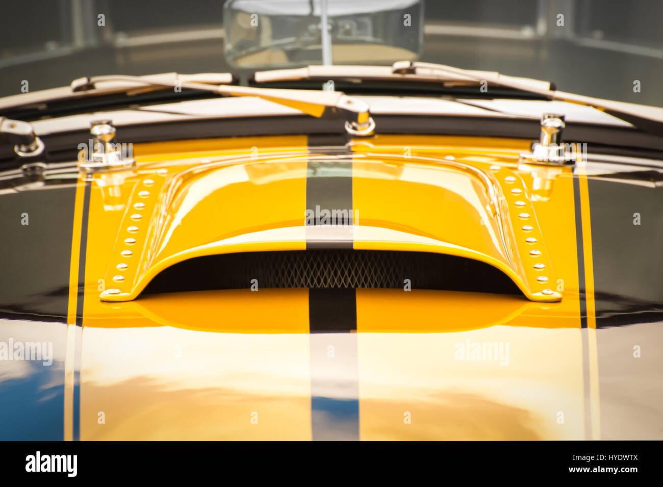 closeup of a muscle car engine hood Stock Photo - Alamy