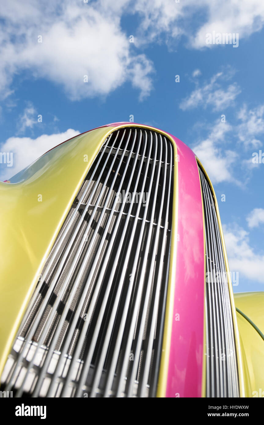 restored classic car radiator grille closeup against blue sky Stock ...