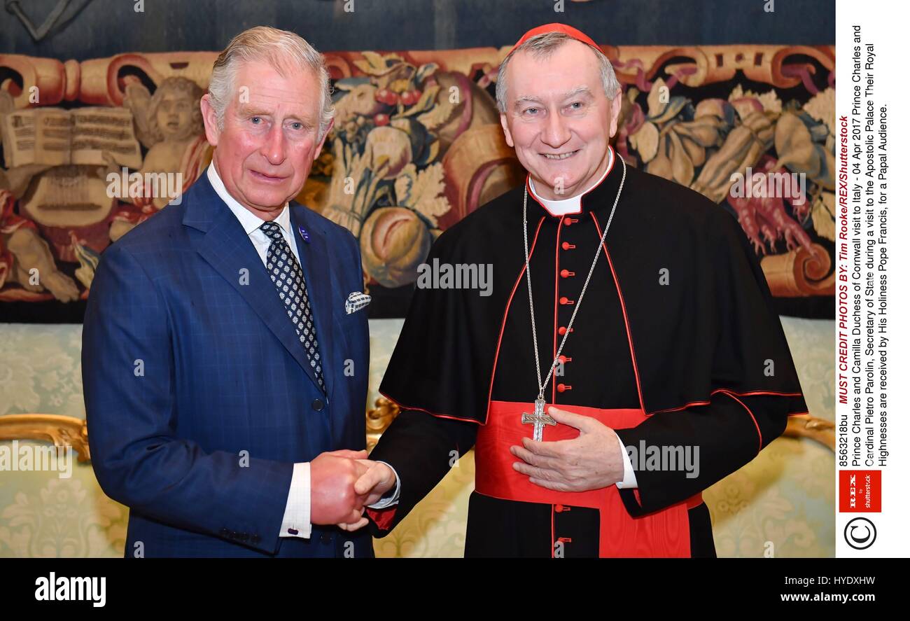 The Prince of Wales shakes hands with Cardinal Pietro Parolin ...