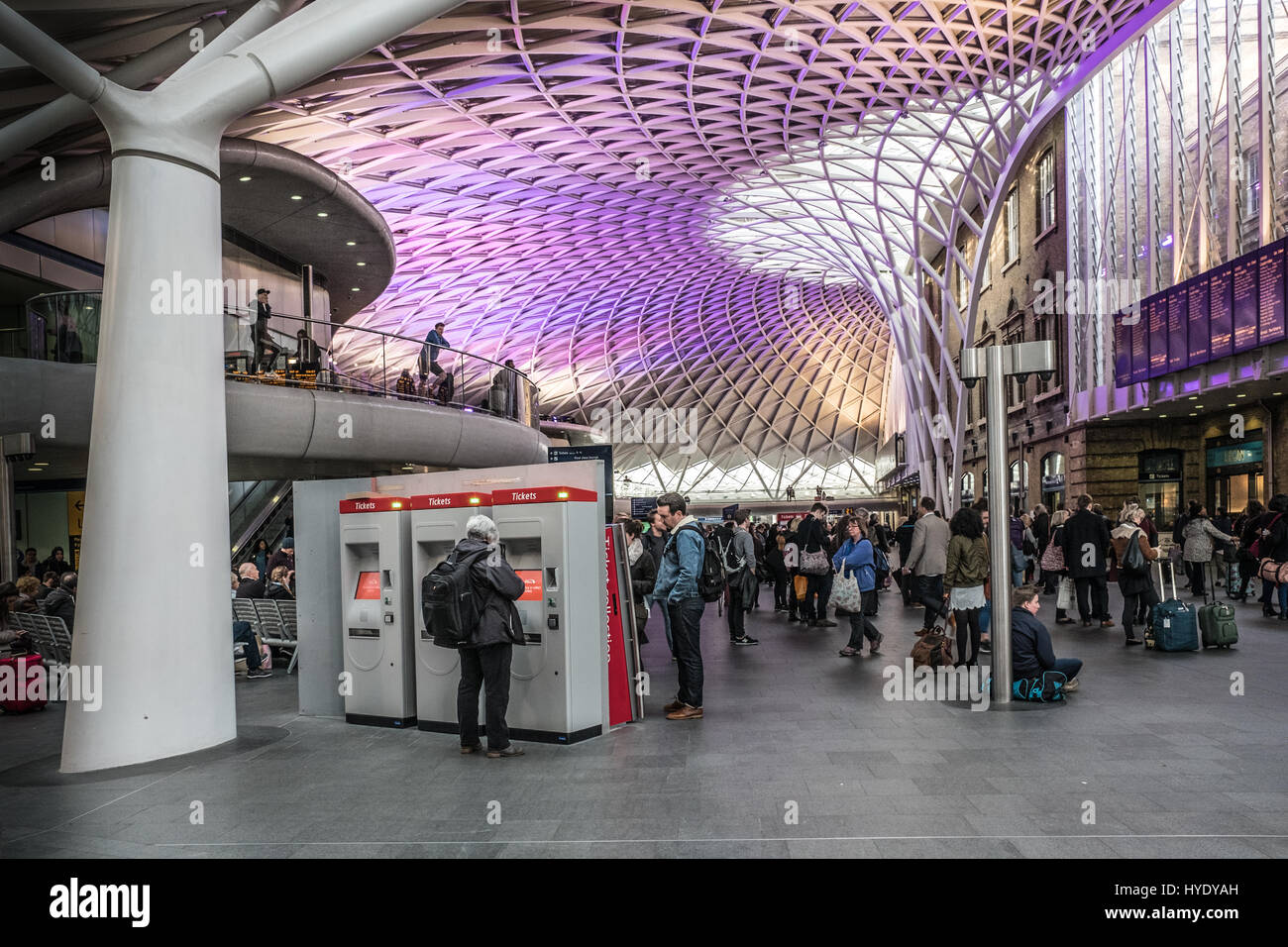 Passengers on the concourse at King's Cross rail station, London ...