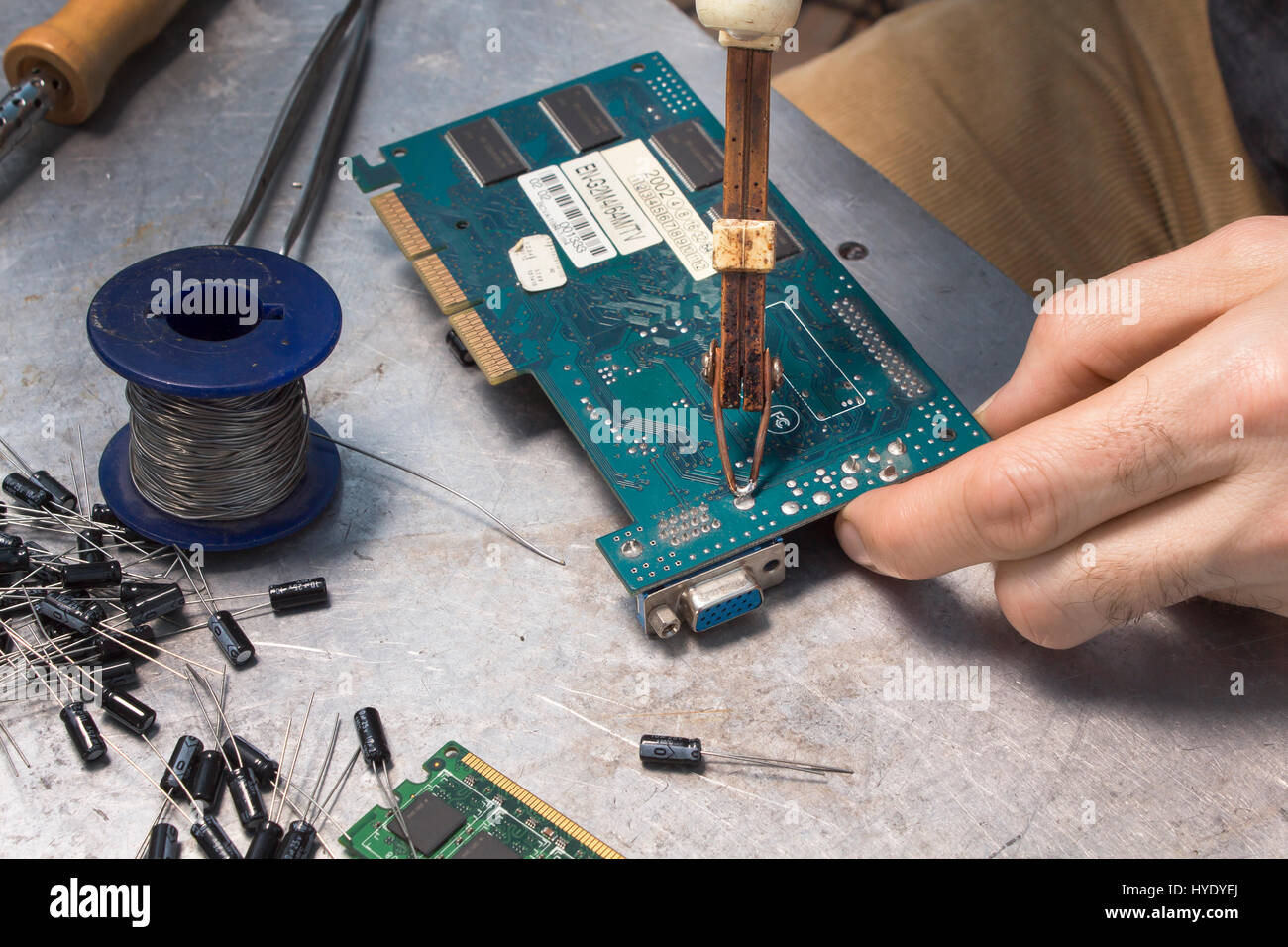 Solder soldering solder integrated circuit. An employee at an electric ...