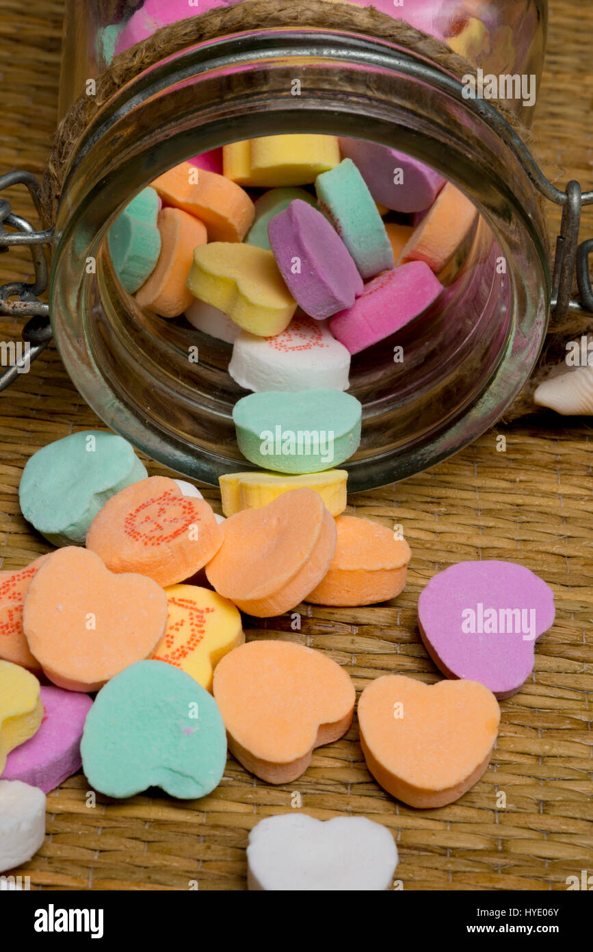 candies spilled on table from jar Stock Photo - Alamy