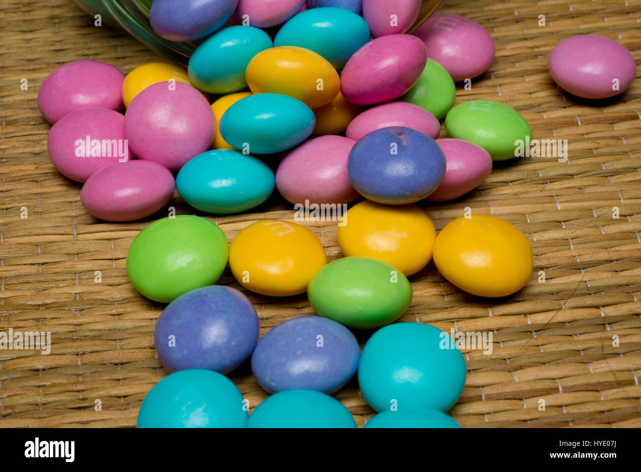 candies spilled on table from jar close up Stock Photo - Alamy