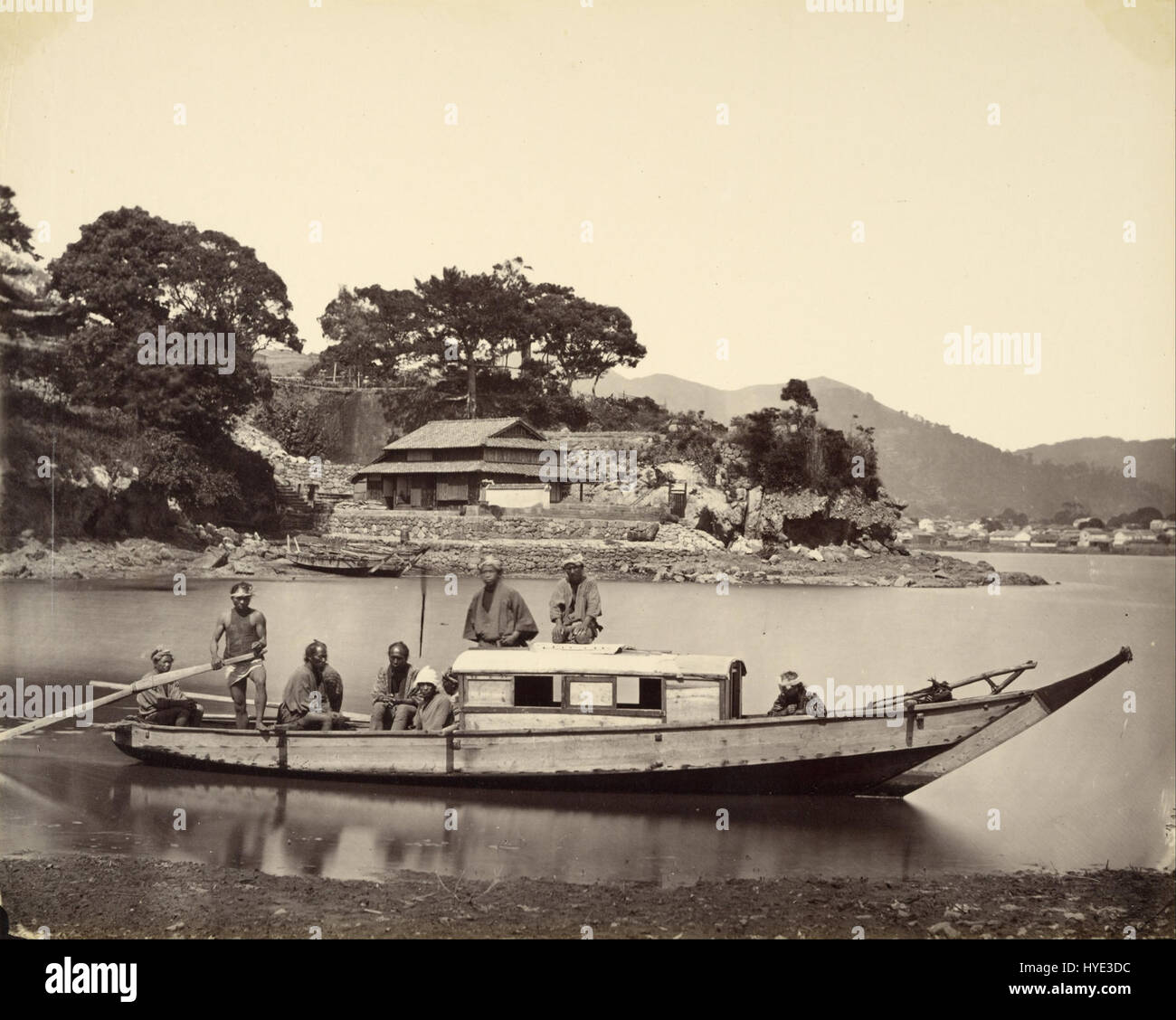 'Japanese Junk in Canal, Nagasaki' by Felice Beato captures a scene of ...
