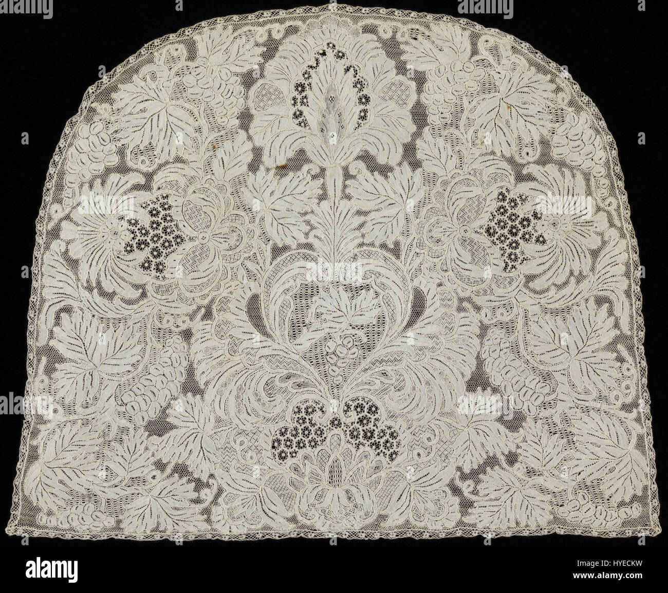 This item is a historical cap crown, possibly related to a ceremonial ...