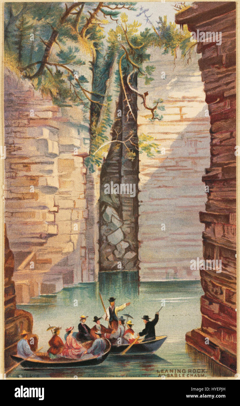 A photograph of Leaning Rock in Ausable Chasm, a natural geological ...