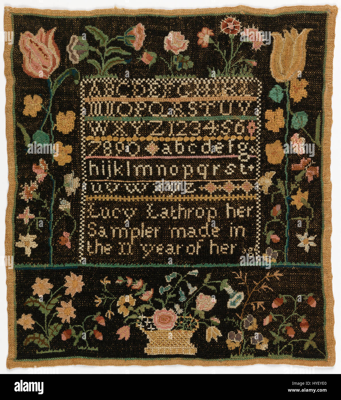 The 'Lucy Lathrop Sampler' is a decorative needlework piece created in ...