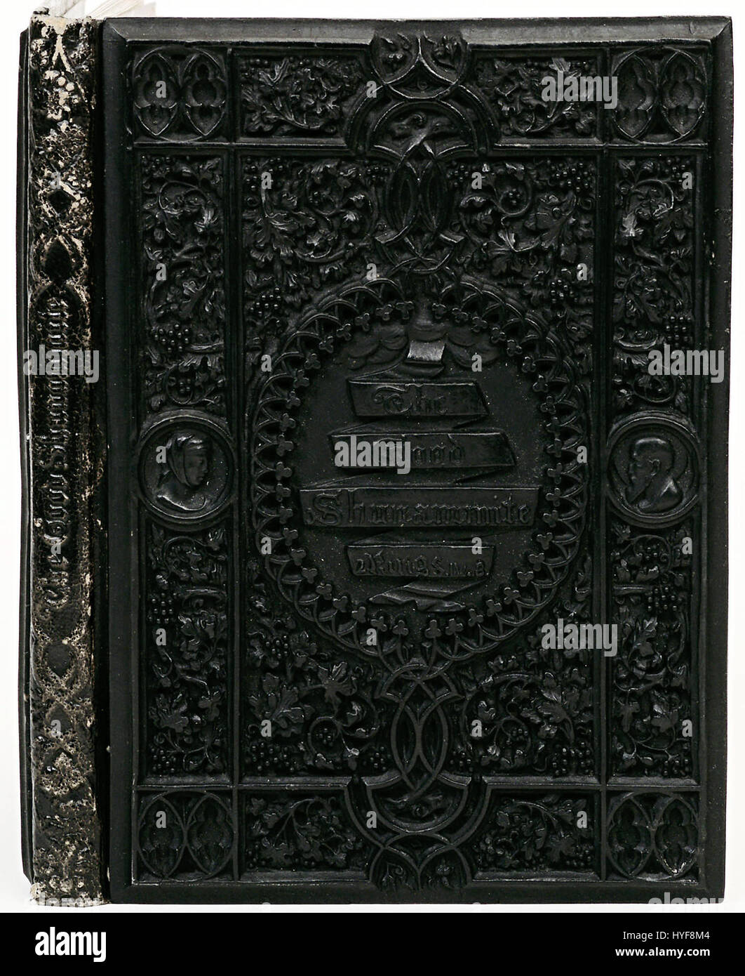 This object is a band of black-painted pressed material, primarily made ...