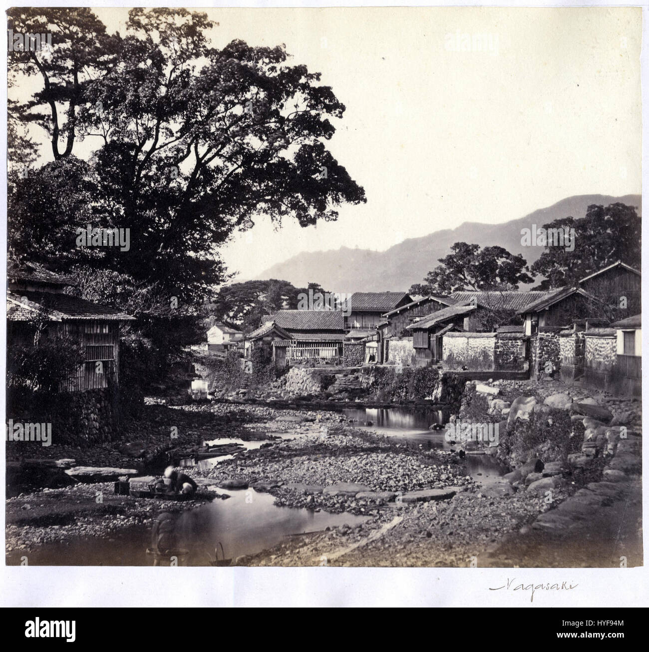 This artwork depicts a scene of Nagasaki, Japan, in 1865. The painting ...