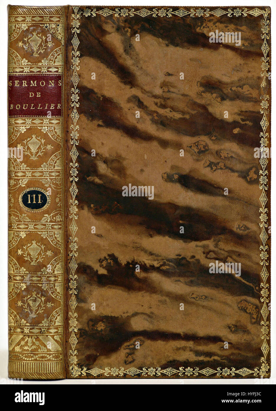A marbled calf leather binding, labeled KONB12 1171F3 4332, is a finely ...