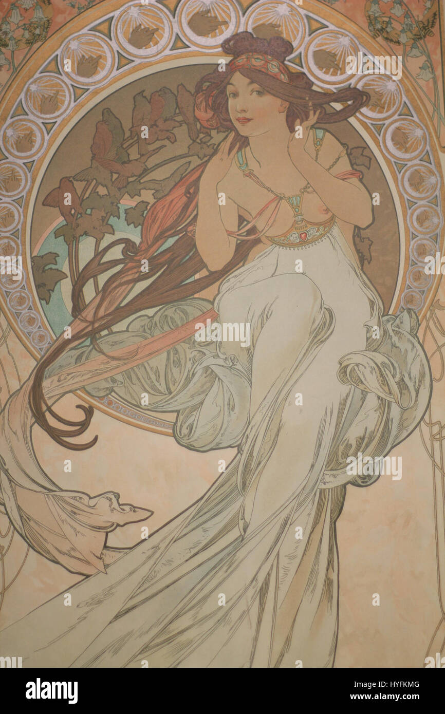 This image showcases an artwork by Alfons Mucha, a key figure in the Art Nouveau movement. The ...