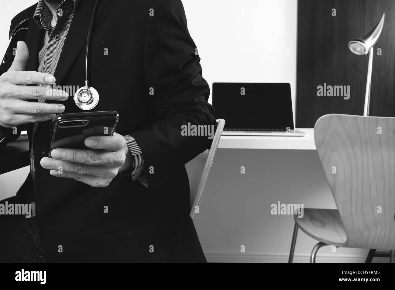 smart medical doctor working with smart phone and digital tablet and ...