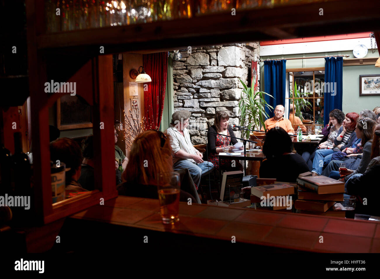 People Reading Poems in a pub, The Literary Festival, Laugharne, Wales ...