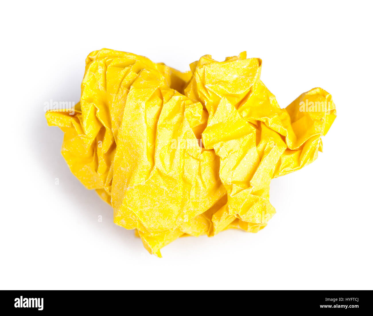 Screwed up piece of yellow paper isolated on white background Stock ...