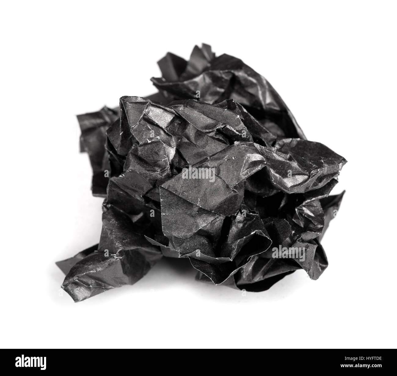 Screwed up piece of black paper isolated on white background Stock ...