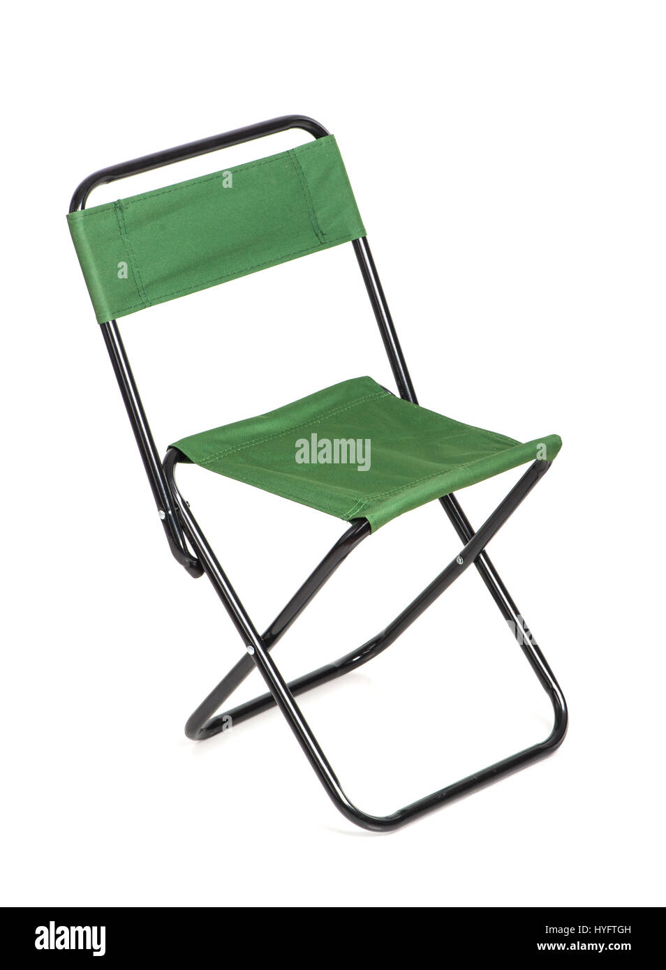 Folding chair with green fabric isolated on white background Stock ...