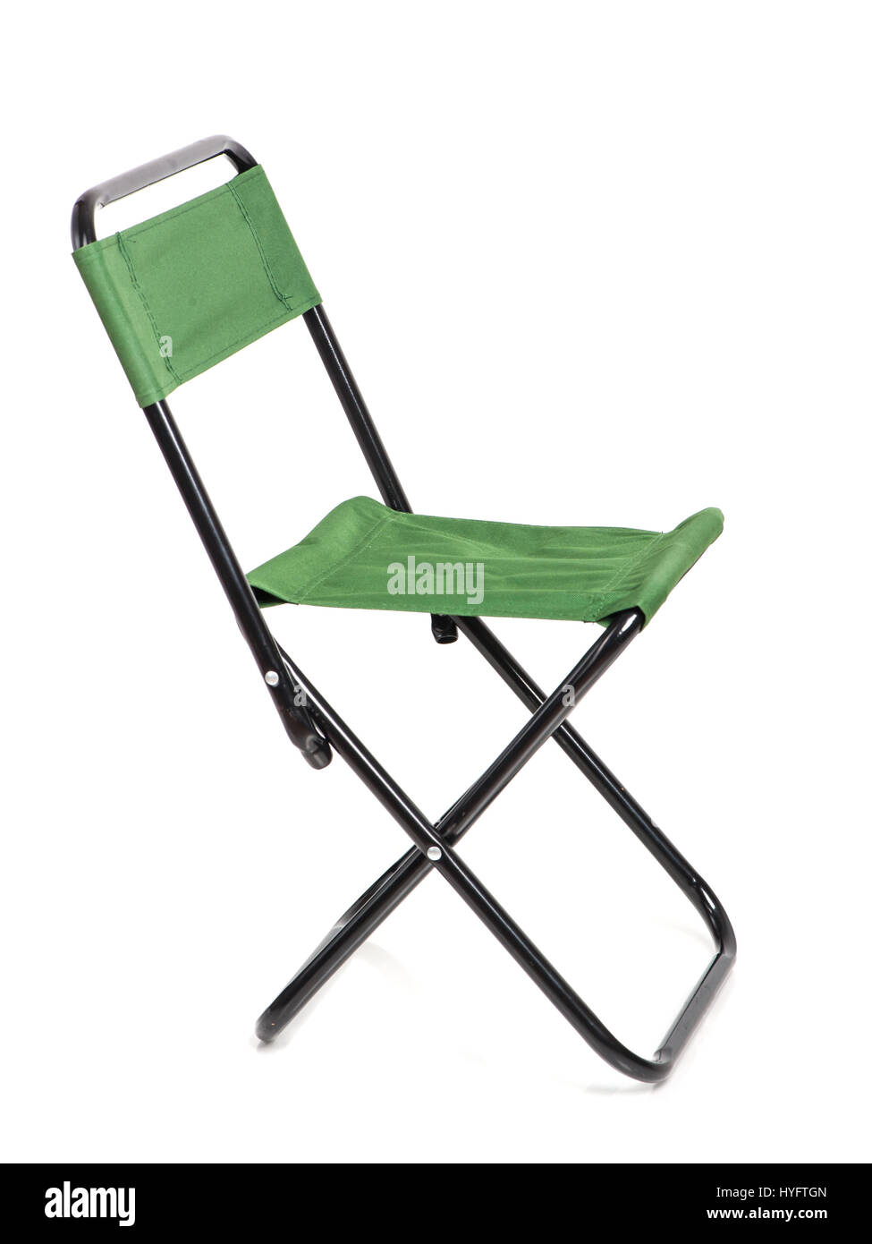 Folding chair with green fabric isolated on white background Stock ...