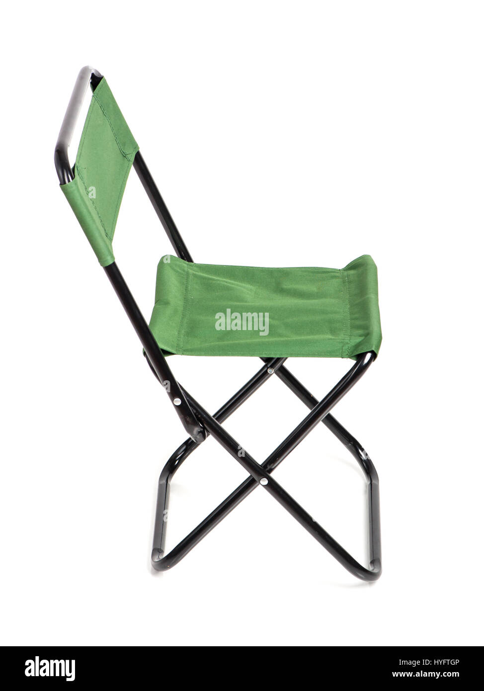 Folding chair with green fabric isolated on white background Stock ...